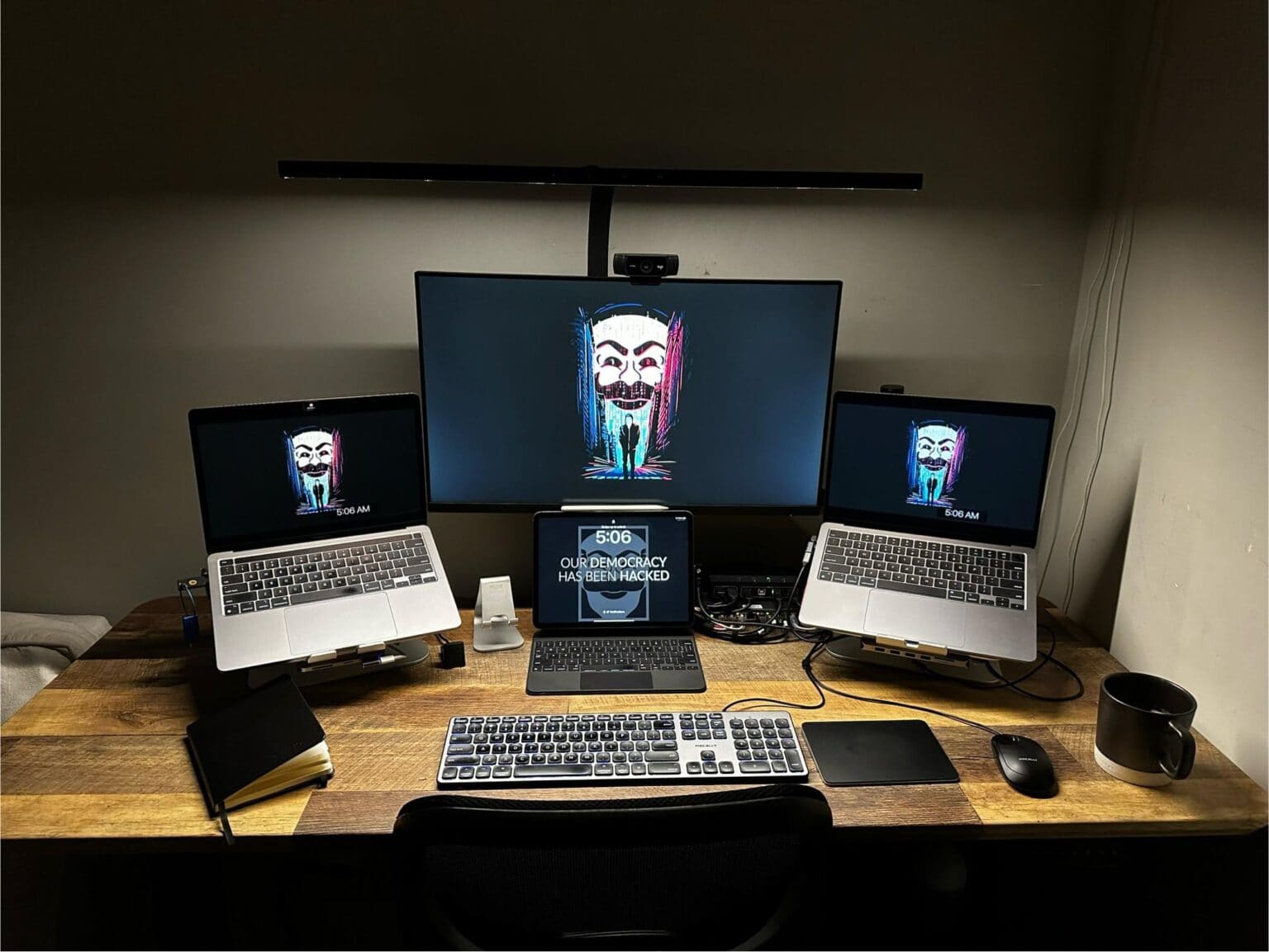 Dual flying MacBooks flank external display and iPad [Setups] | Cult of Mac